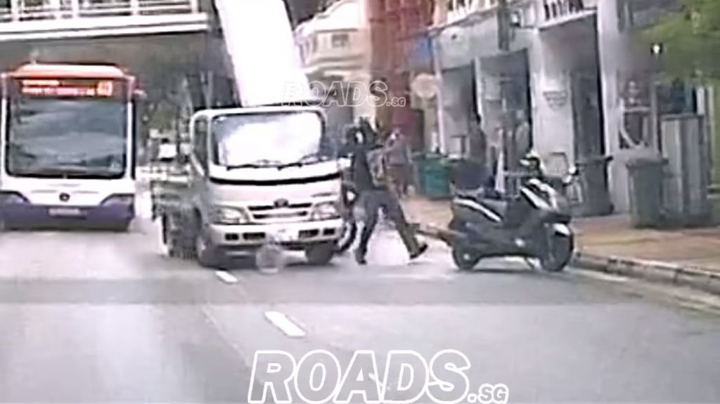 Lorry Tries To Run Motorcyclist Down After He High Kicks The Mirror Off