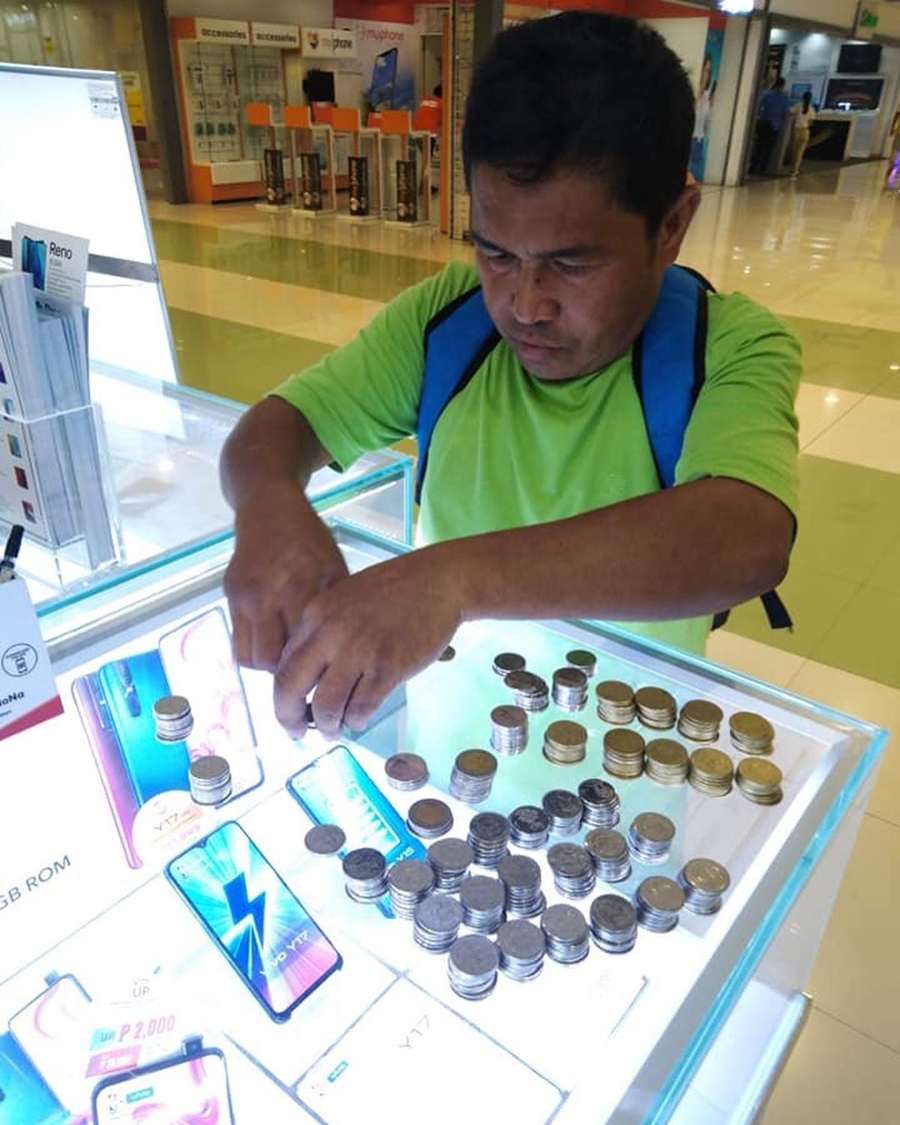 Loving Father Pays For Son's Dream Phone Using Coins He Saved Daily
