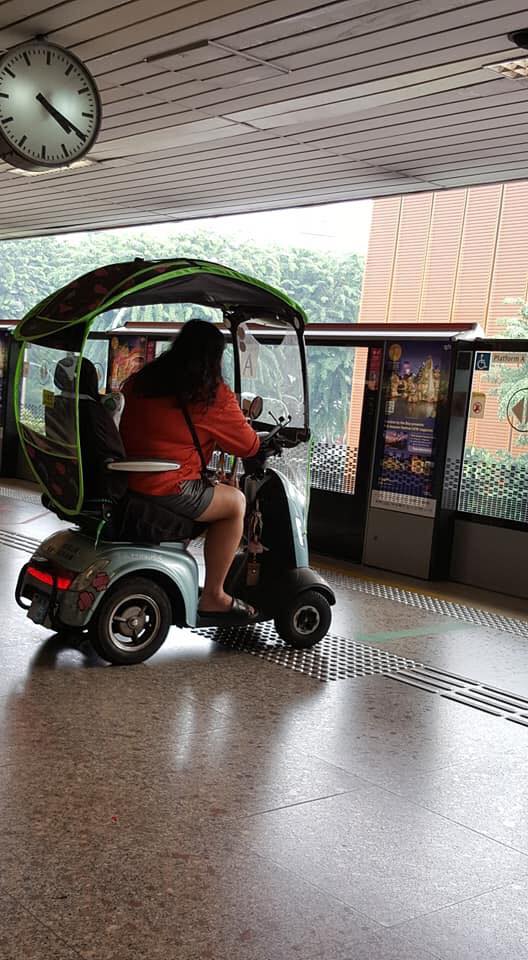 Woman Gets Flak For Riding Mobility Aid At MRT, She Needs It To Deliver ...