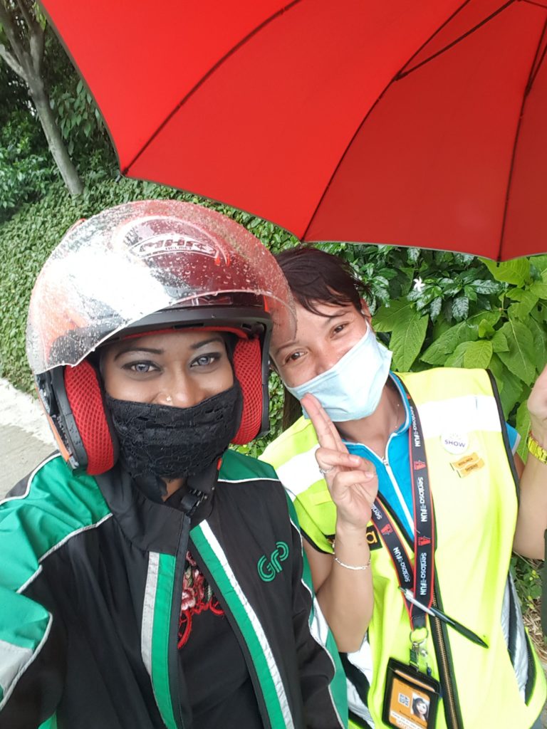 Lady Waits For Her Husband At Sentosa Entrance In The Rain, Staff ...