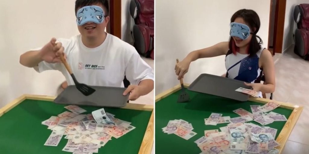 S’pore Families Play Blindfolded Money Scooping Game For CNY, Hilarious ...