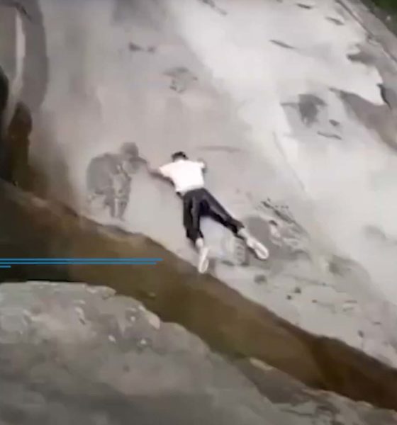 Man In China Slips & Slides Down Waterfall At High Speed, Miraculously ...