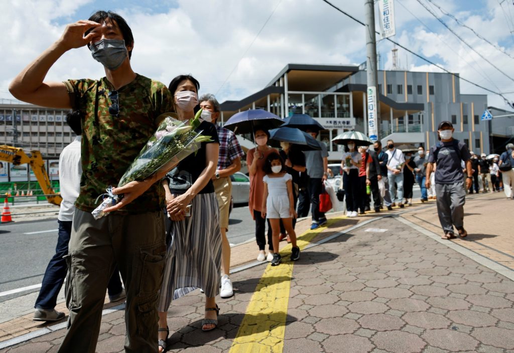 Mourners Pay Tribute To Shinzo Abe, Lay Flowers & Pray At Scene Where ...
