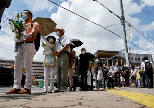Mourners Pay Tribute To Shinzo Abe, Lay Flowers & Pray At Scene Where ...