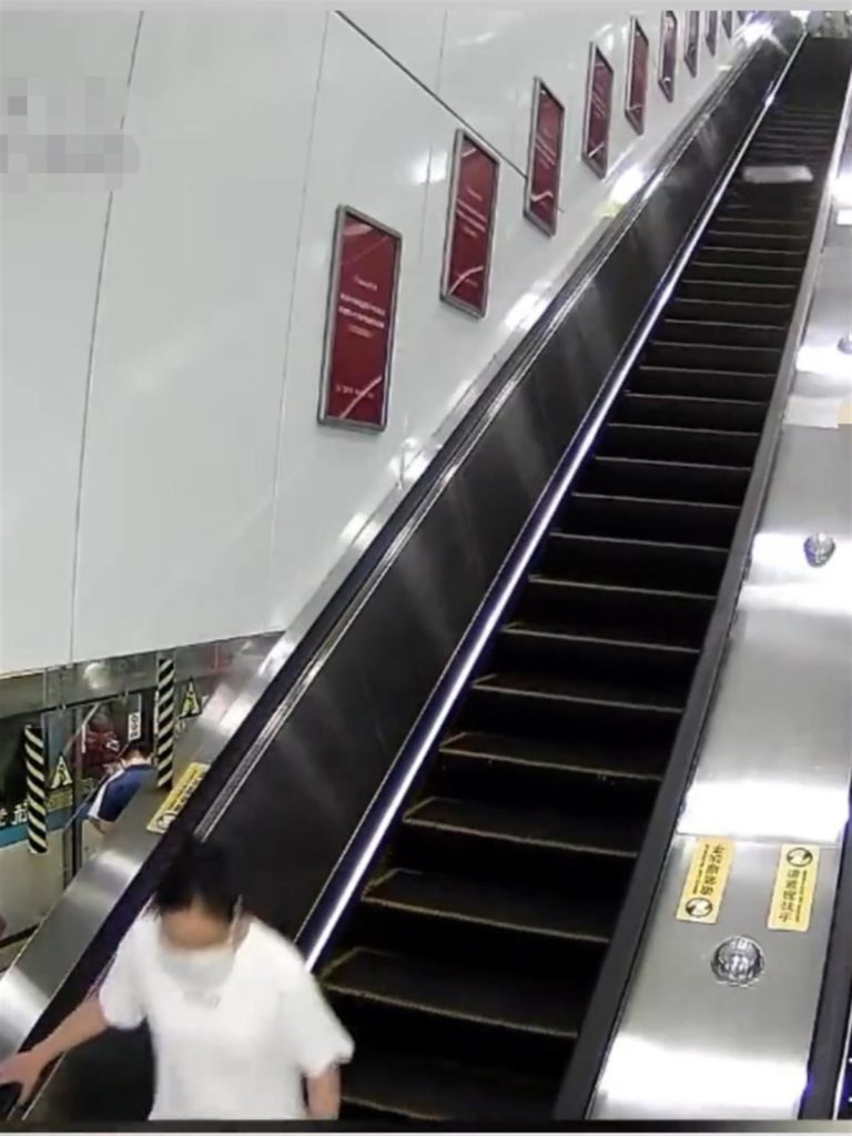 Suitcase Tumbles Down Escalator & Hits Woman In China, Victim ...