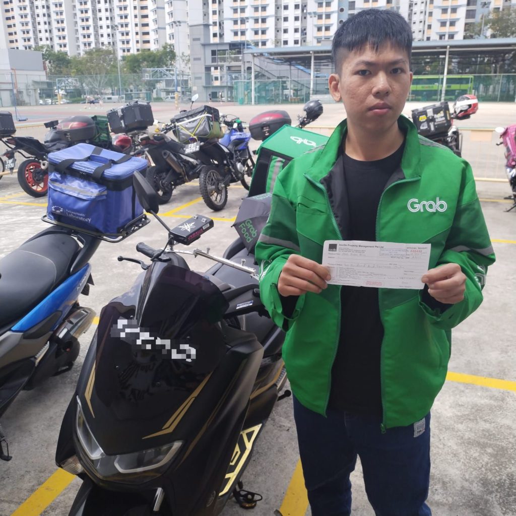 Grab Delivery Rider Has Motorbike Wheel Clamped At Bishan Condo, Loses ...