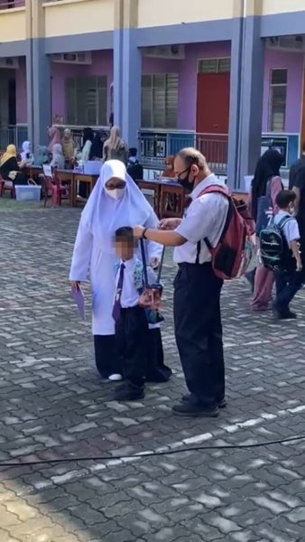 M’sian Parents Dress Up In School Uniforms To Support Son On First Day ...
