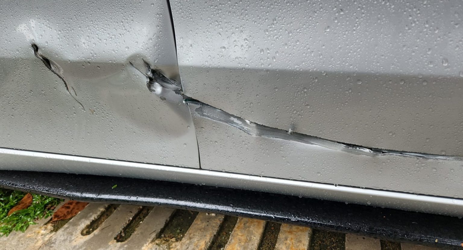 Car Damaged By Loose Drain Cover On Bartley Road Flyover, Owner Seeks ...