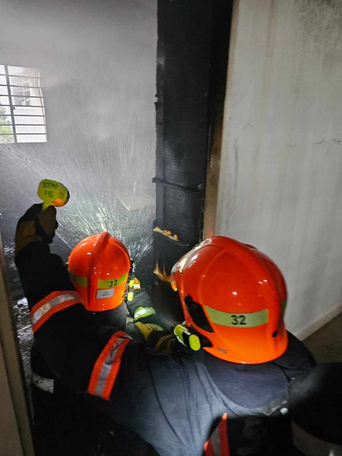 Fire Breaks Out At Serangoon Flat, SCDF Officers Rescue Cat From Unit