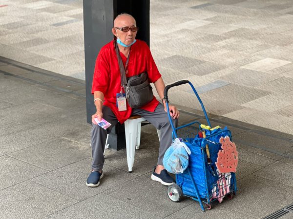 Elderly Stateless Man From M'sia Sells Tissue In Paya Lebar, Eats One ...