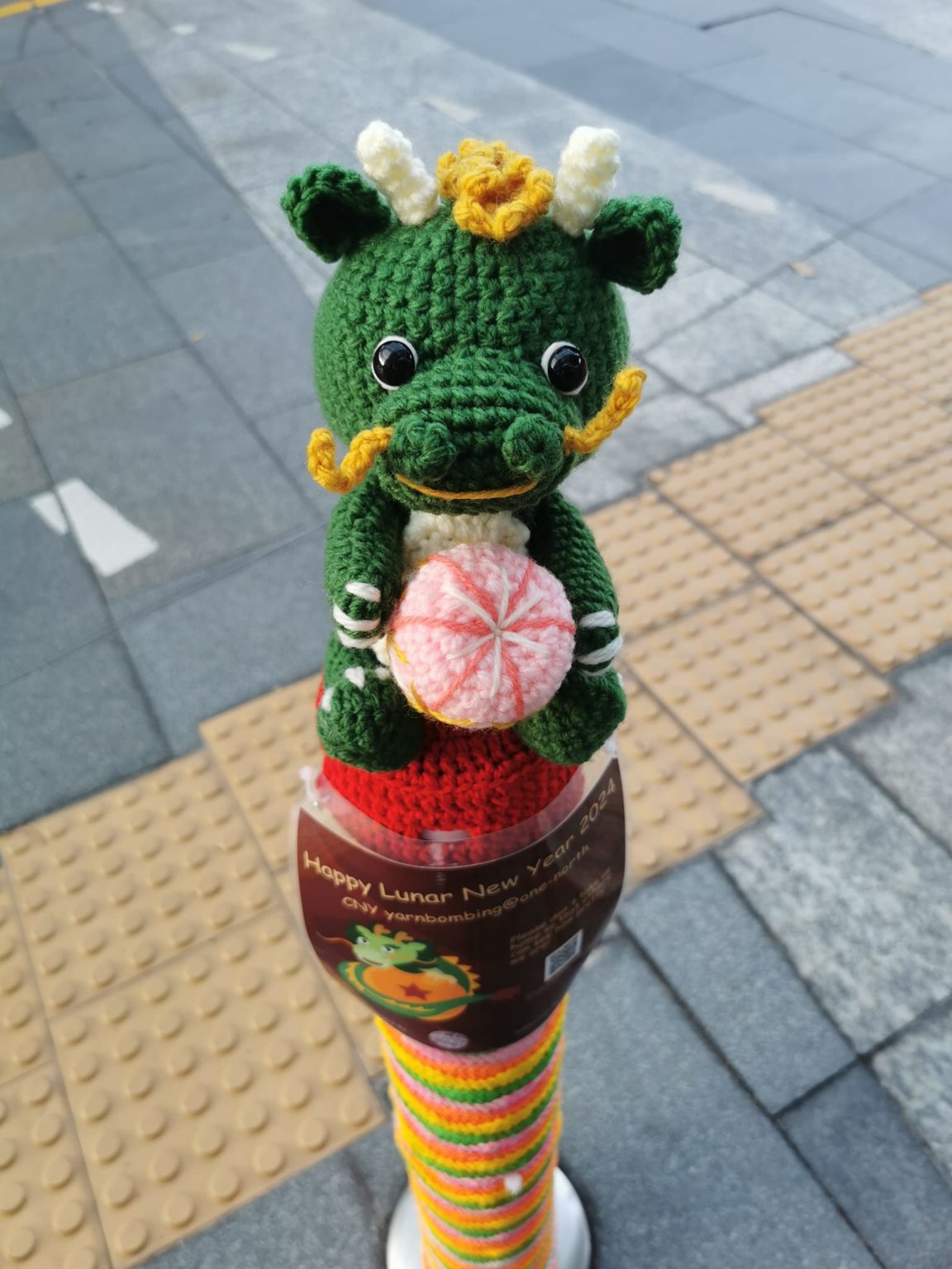 Cute Dragon Toppers Atop One-North Bollards Bring Festive Joy For CNY