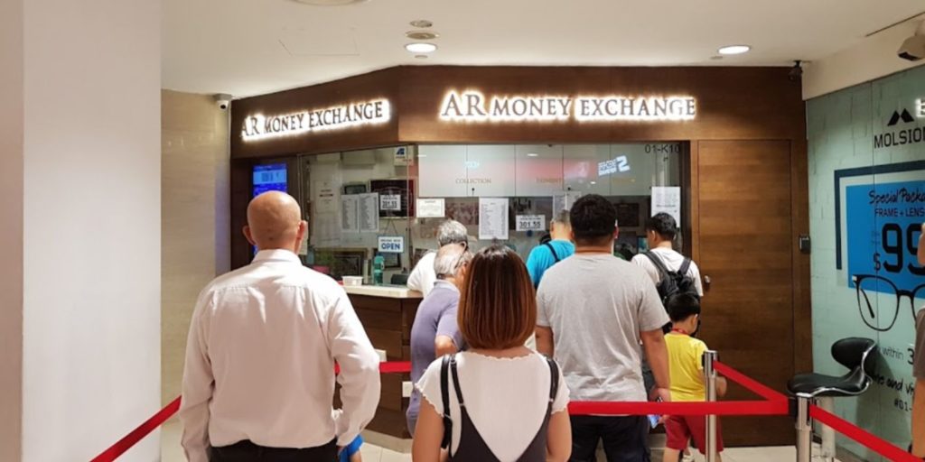 Workers turn to S’pore money changers as M’sian law requires customers ...