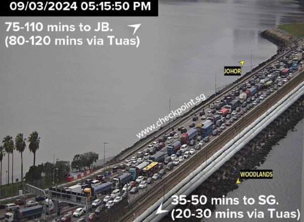 S'pore land checkpoints see traffic jams of up to 3 hours as March ...