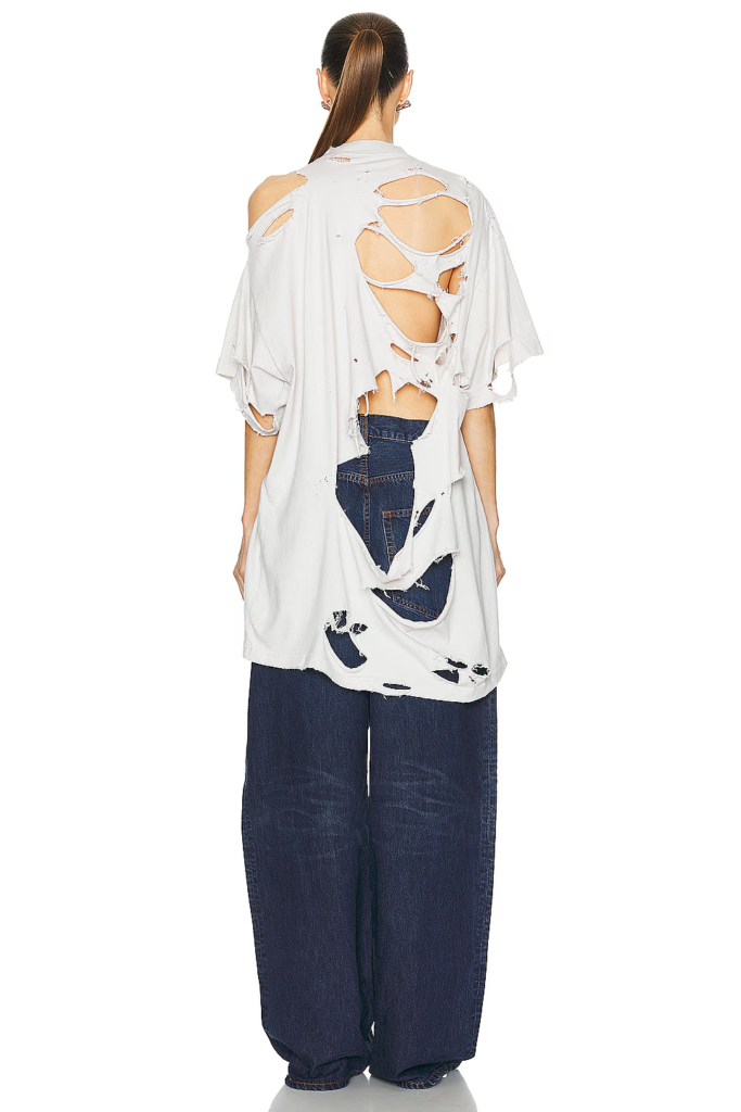 Cook wears tattered t-shirt that resembles Balenciaga's S$1.4K tee