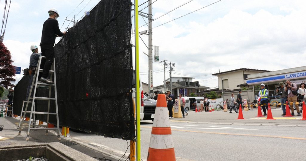 Mesh barrier blocking Mount Fuji at popular tourist photo spot erected ...