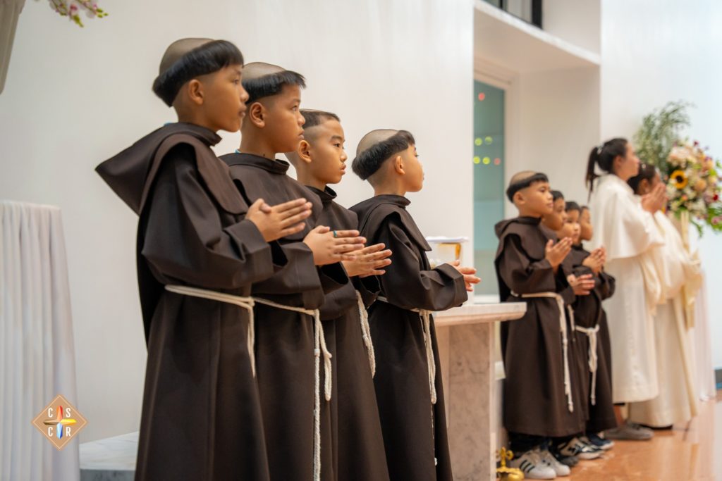 Young boys get Catholic monk haircuts for church event in Thailand