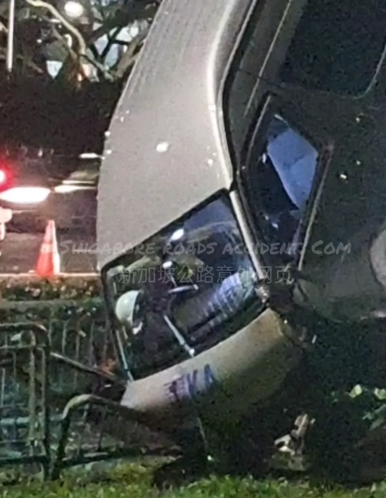 Van lands in a vertical position after skidding along ECP