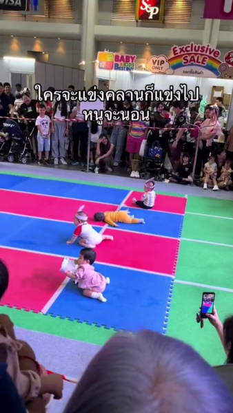 Baby in Thailand enters crawling competition, decides to nap instead