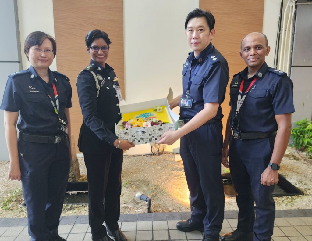 ICA receives birthday cake from M'sia for National Day, wholesome ...