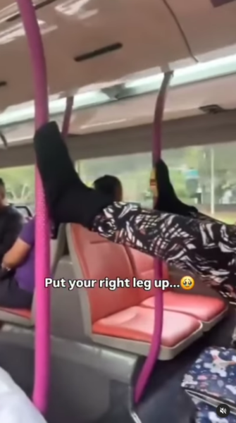 Woman arrested after putting feet on bus seat in 2023 filmed putting ...