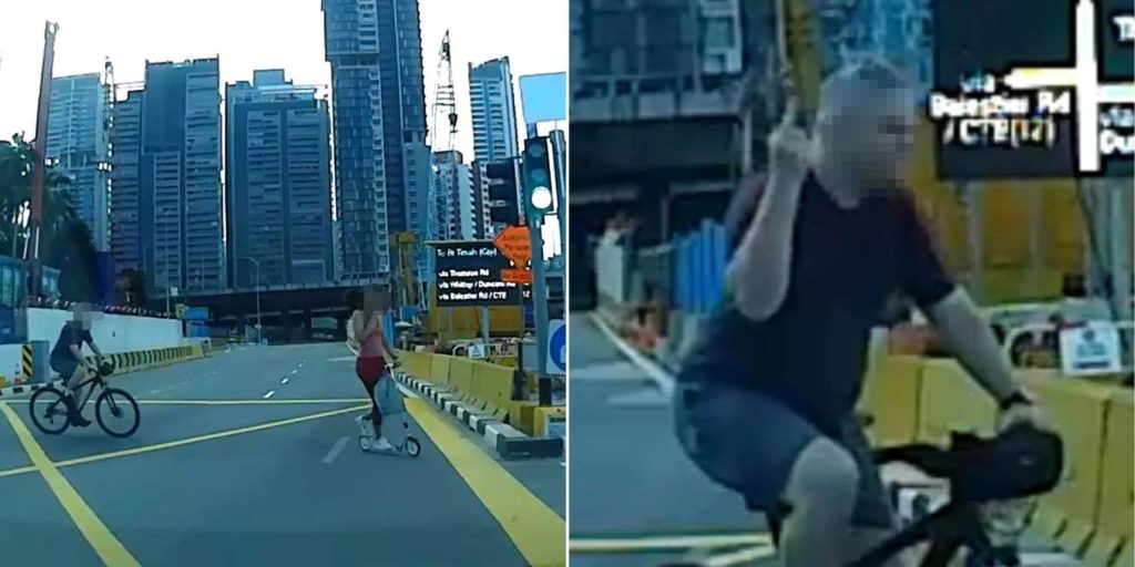 Cyclist flips driver off while beating red light at Thomson Road junction