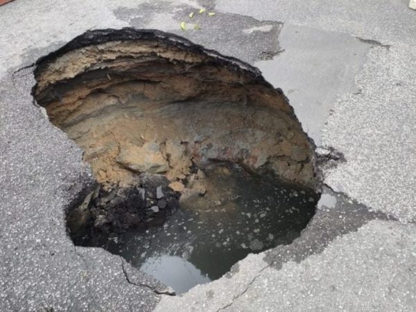 School bus gets stuck in 1-metre wide sinkhole in Penang