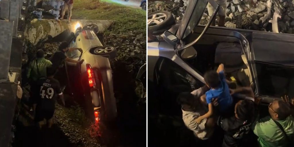 Passersby work together to rescue trapped passengers after car overturns in ditch in M'sia