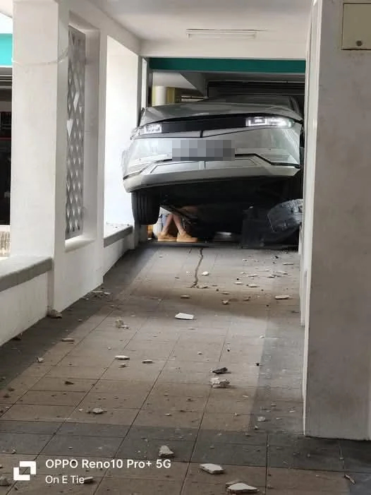 Car crashes into pedestrian walkway in Toa Payoh car park, gets stuck in corridor