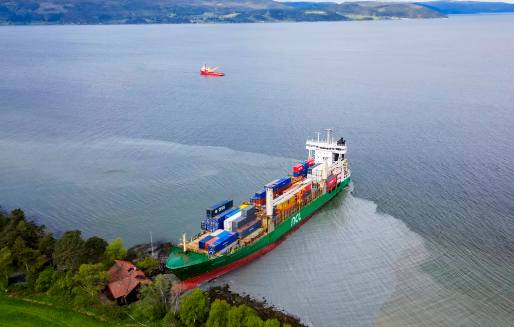 Man in Norway wakes up to find container ship crashed in his garden ...