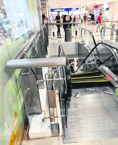HarbourFront Centre escalator warps after stroller wheel gets stuck ...