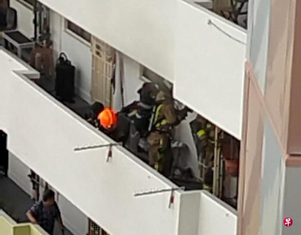Altar allegedly sparks fire in Bukit Merah HDB flat, SCDF breaks in to ...