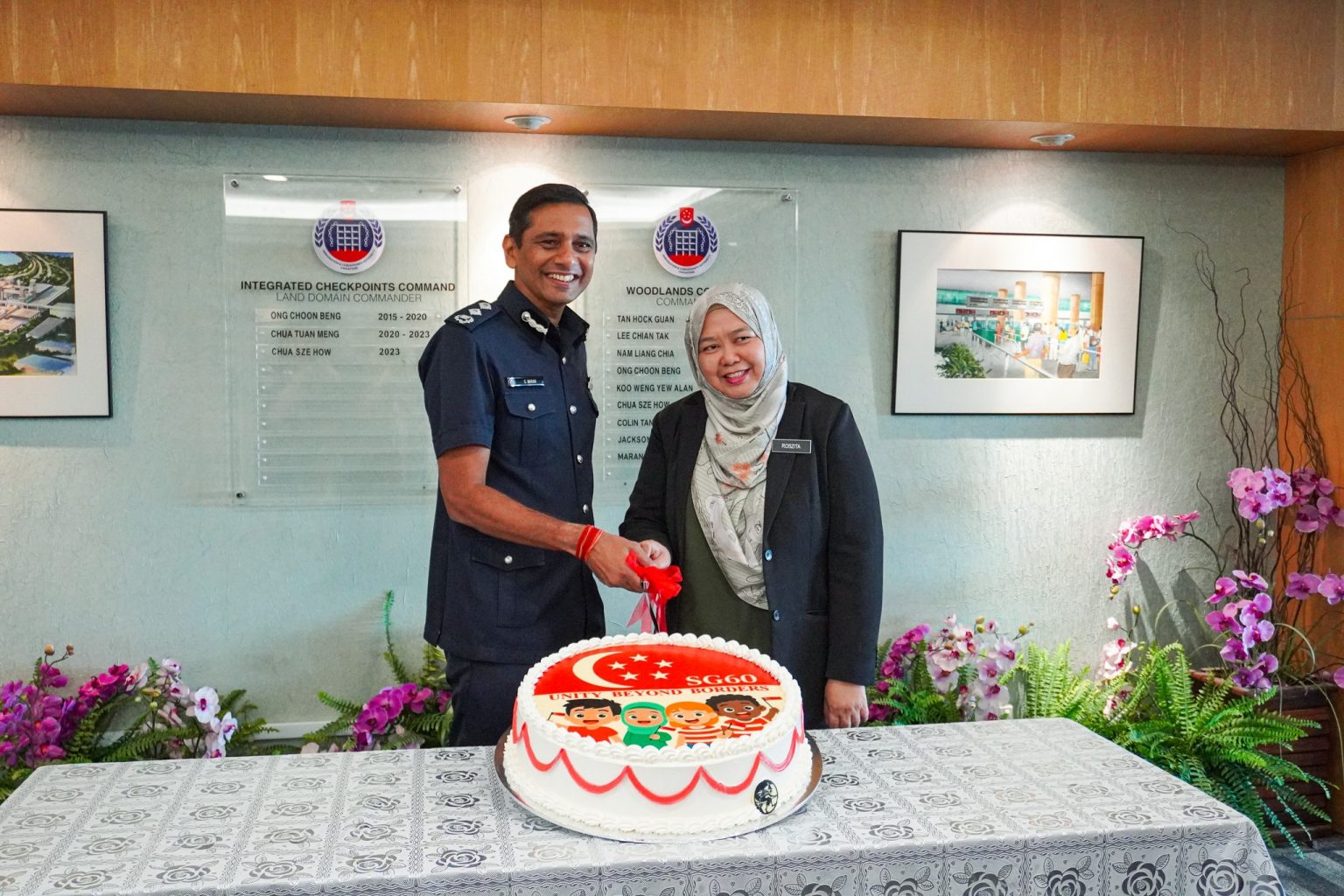 ICA presented with SG60 cake from M'sia for National Day, comes with ...
