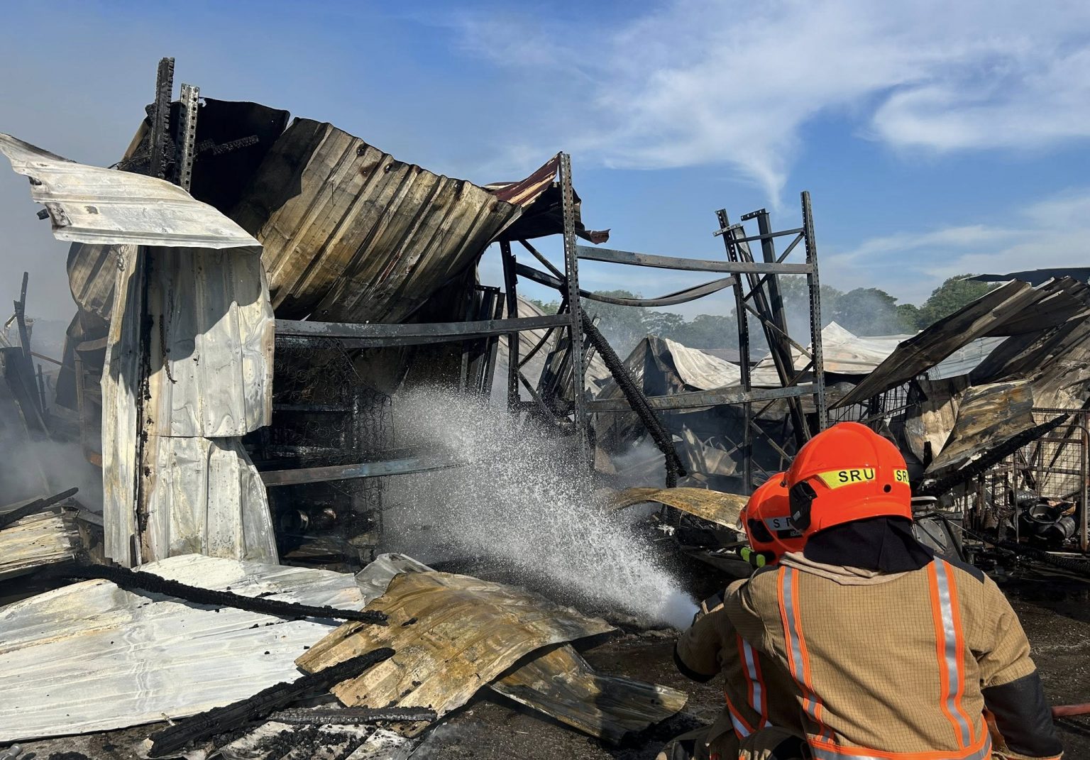 SCDF firefighters battle storage shed fire at Sungei Tengah, no ...