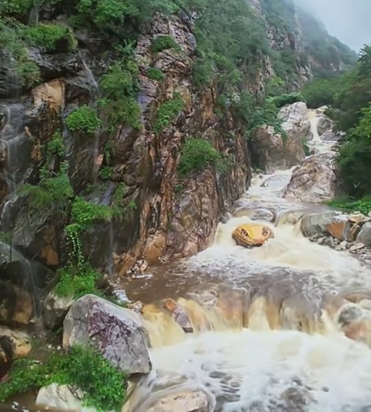 Rock painted to look like giant python on China mountain scares ...