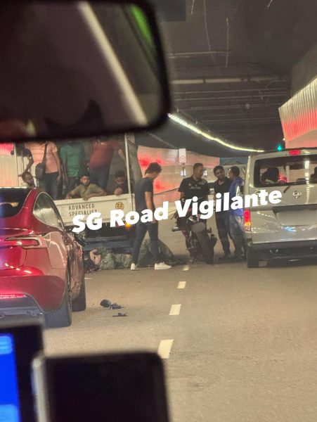 Motorcyclist in SAF uniform lies on road after accident along KPE ...